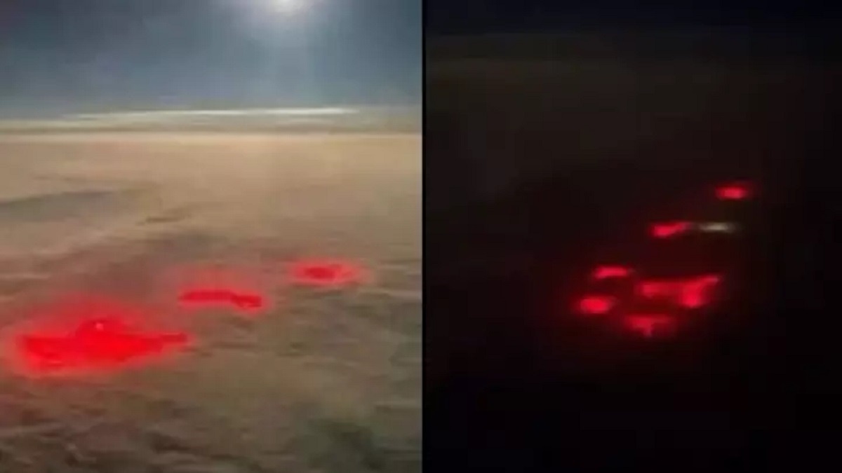 A Mysterious Red Spot Seen In The Clouds By An Airplane Pilot